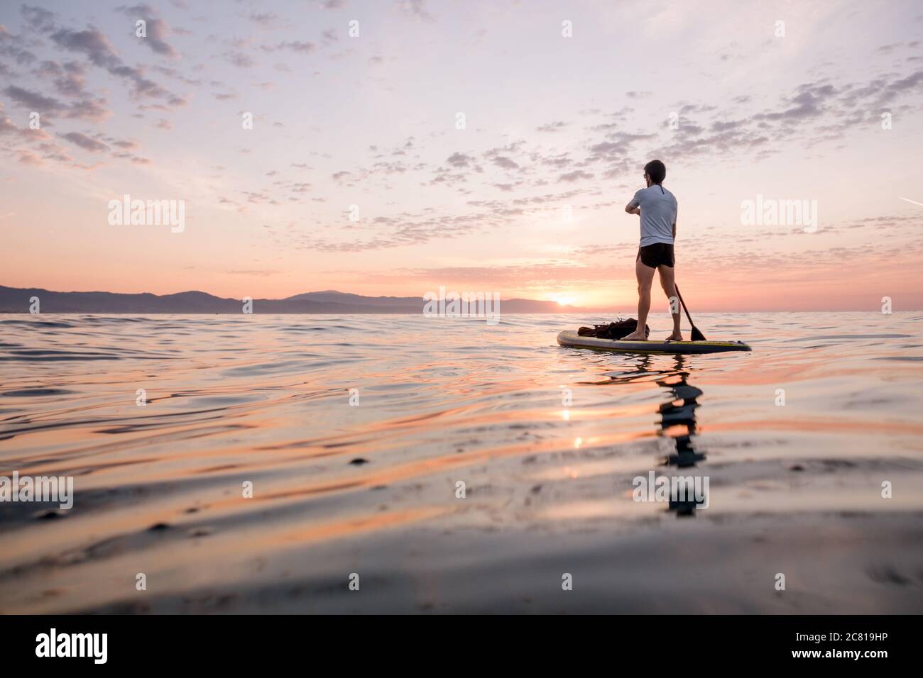 Upright paddle boarding hi-res stock photography and images - Alamy