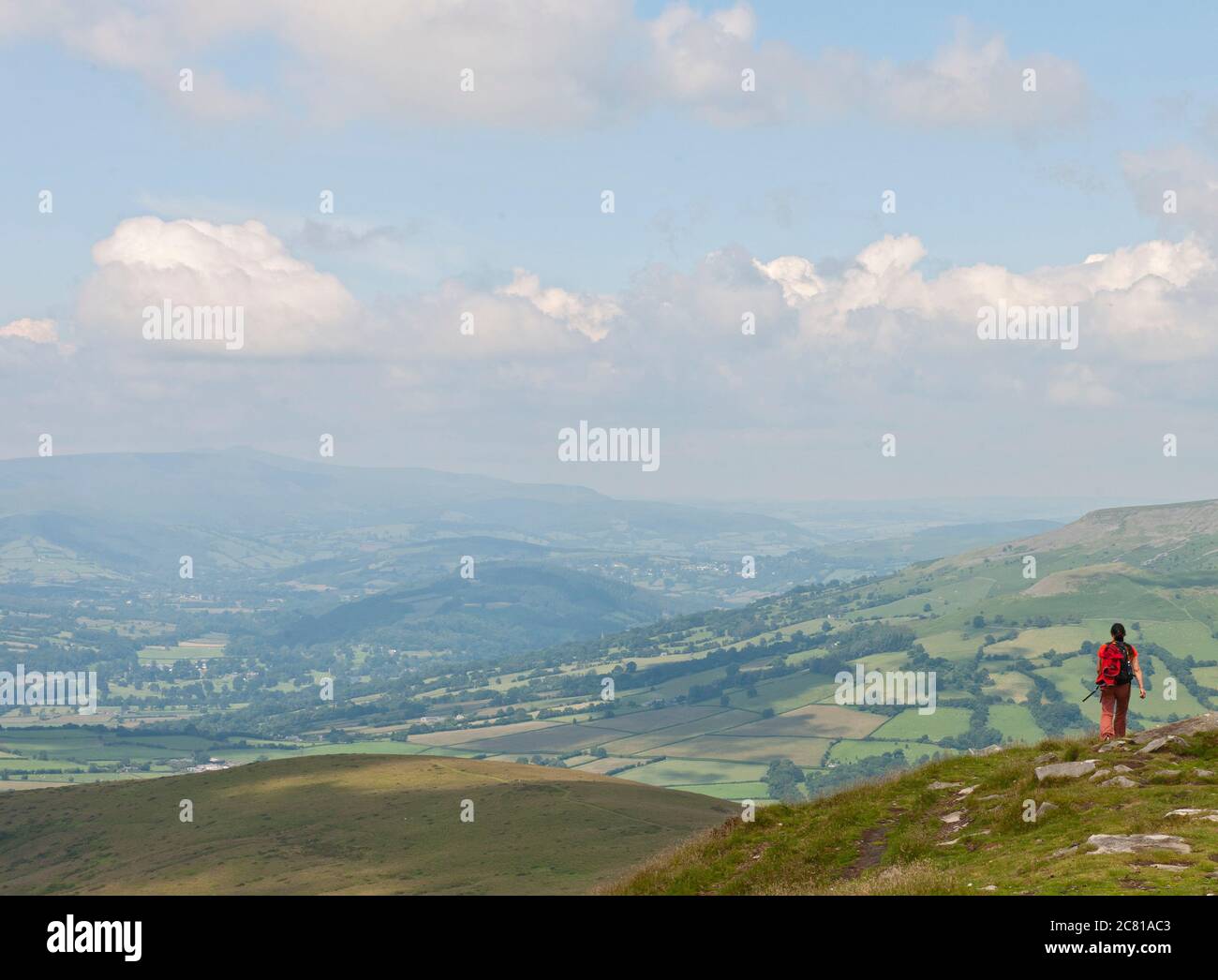 Asian woman hiking through landscape hi-res stock photography and ...