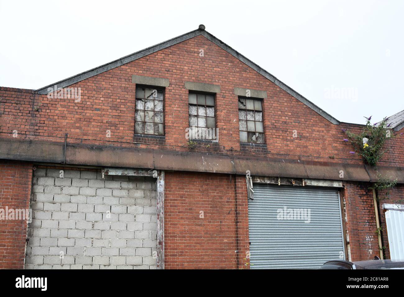 Derelict buildings on dock, old lock ups and storage units left empty ...