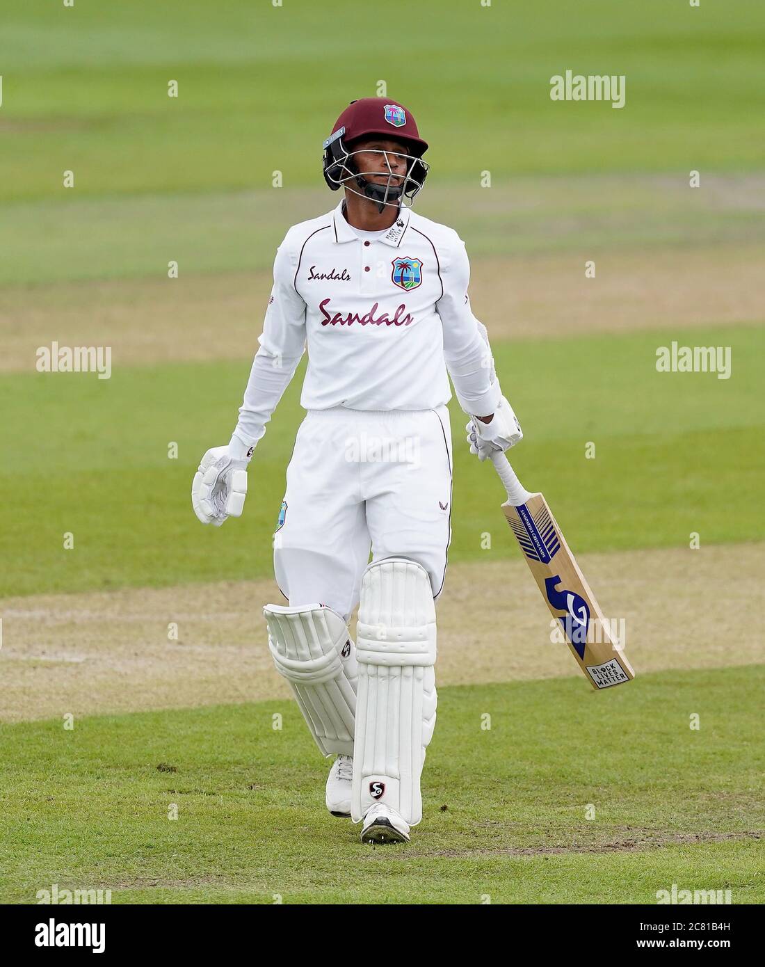West Indies' Shane Dowrich walks off the pitch after getting out during ...