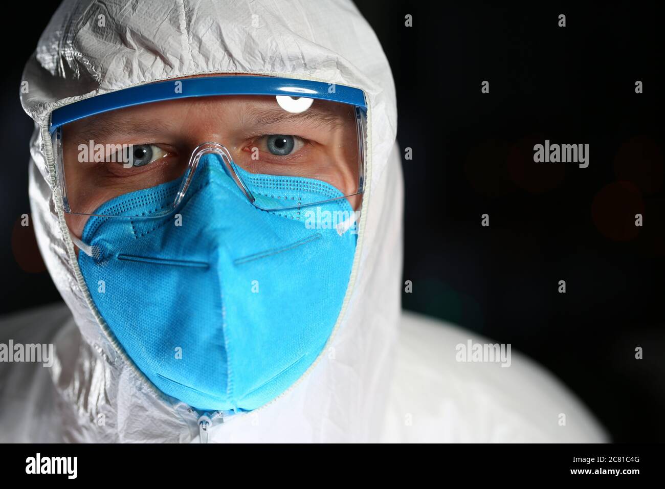Man in PPE suit working during pandemic times Stock Photo - Alamy