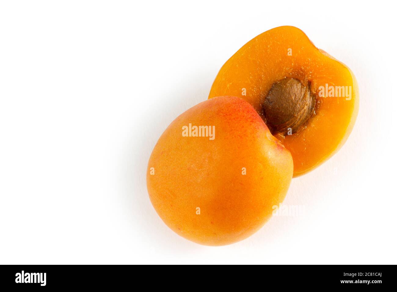 apricots on a white background Stock Photo - Alamy