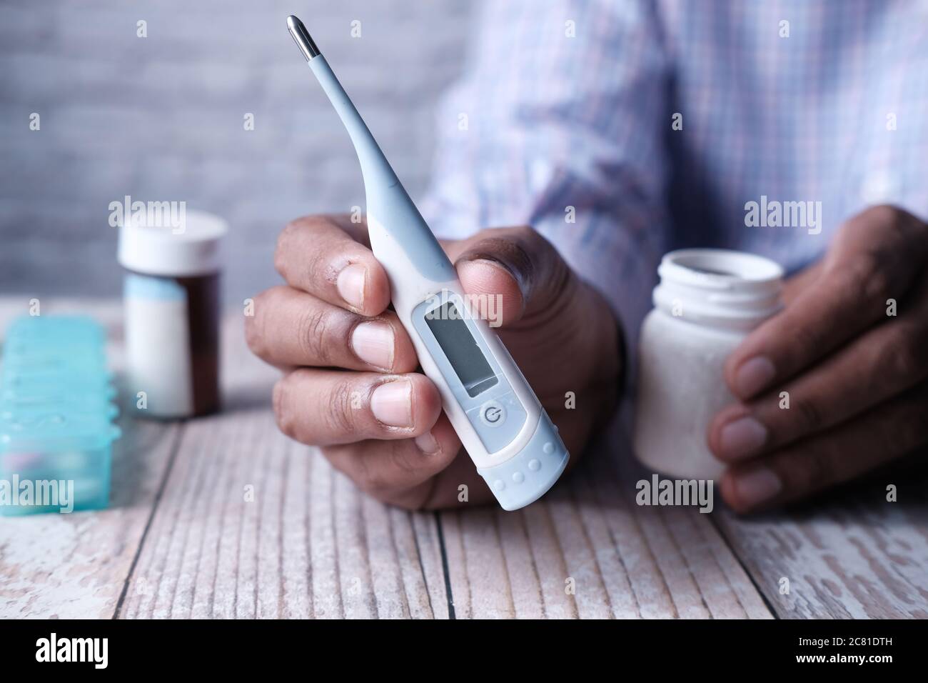 Medical thermometer for measuring body temperature in the hand Stock ...