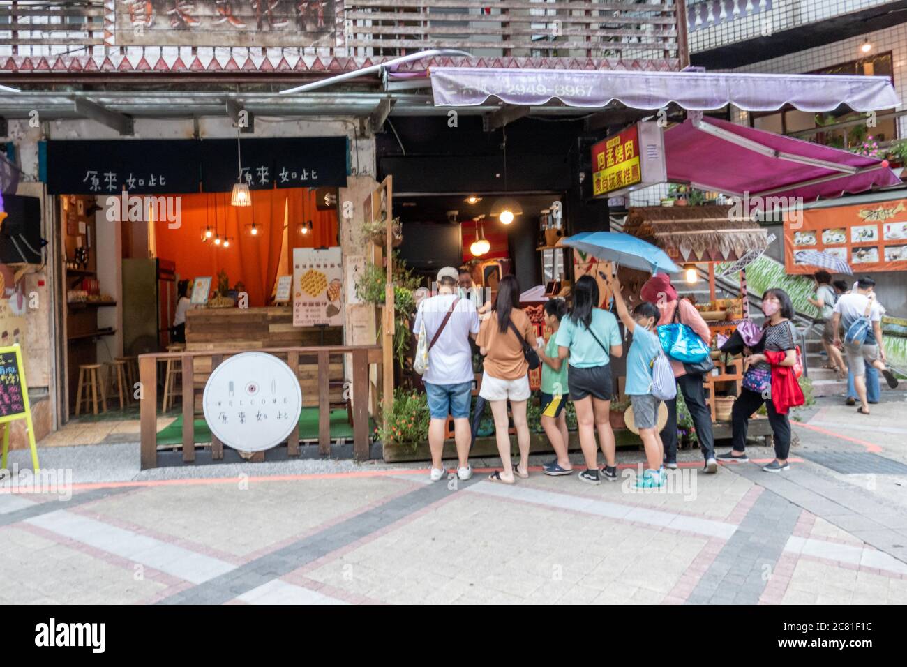 NEW TAIPEI CITY, TAIWAN - JULY 19 2020: Crowds of shoppers in Wulai, an ...