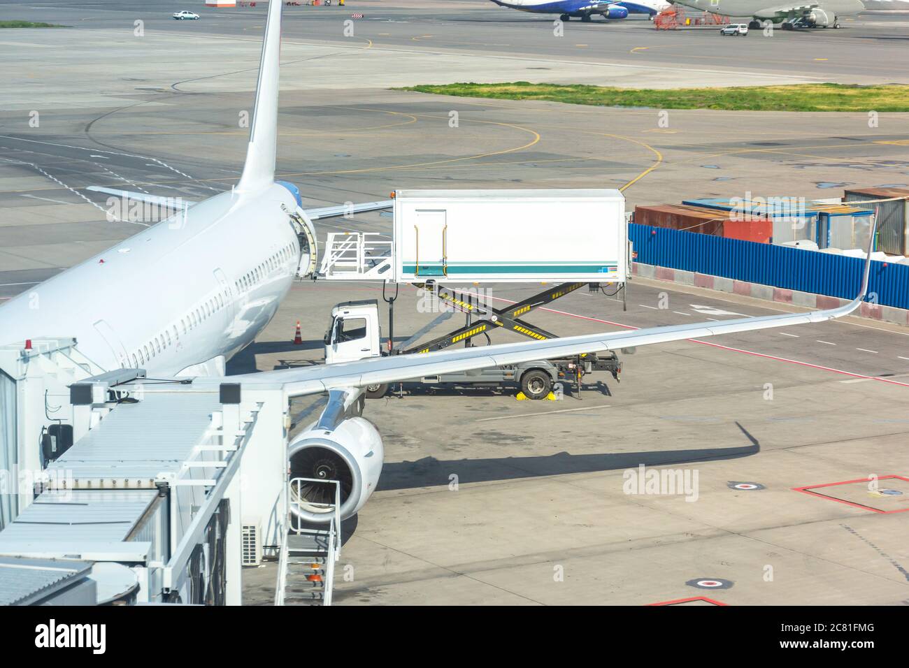 Loading food and food into the plane required for a commercial ...