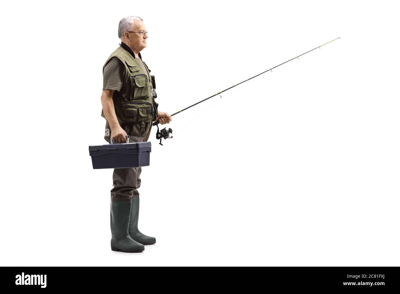 Full length profile shot of an elderly fisherman with a box and fishing ...
