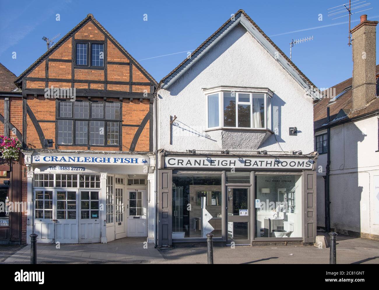 shops on cranleigh village high street surrey Stock Photo - Alamy