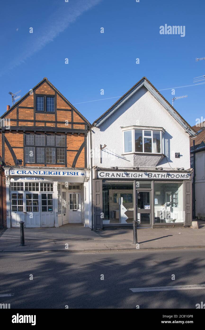 shops on cranleigh village high street surrey Stock Photo - Alamy