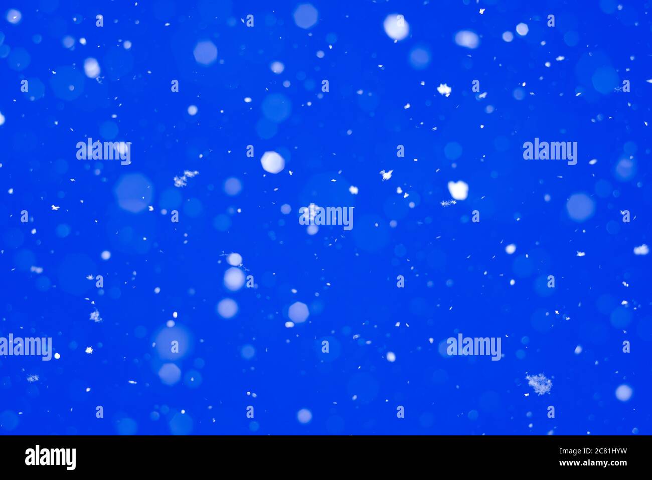 Snowflake blue background hi-res stock photography and images - Alamy