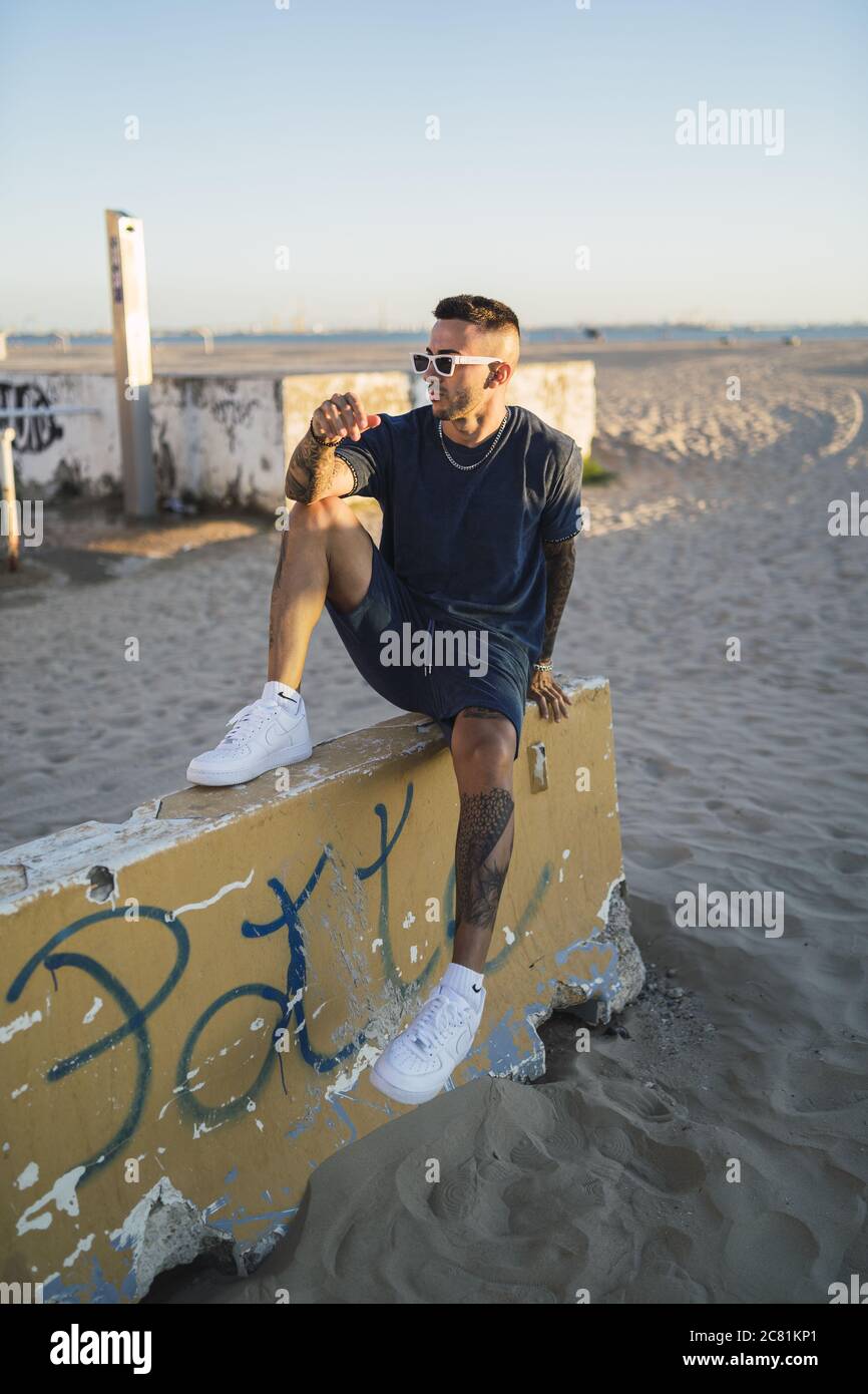 Male models on beach hi-res stock photography and images - Alamy