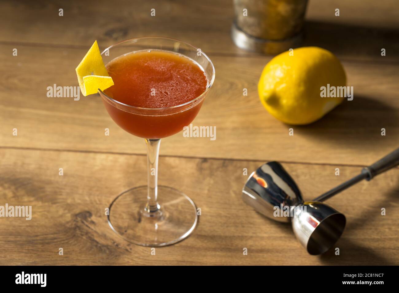 Boozy Bourbon Paper Plane Cocktail with Lemon Juice Stock Photo - Alamy