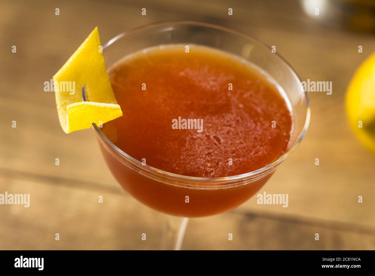 Boozy Bourbon Paper Plane Cocktail with Lemon Juice Stock Photo - Alamy