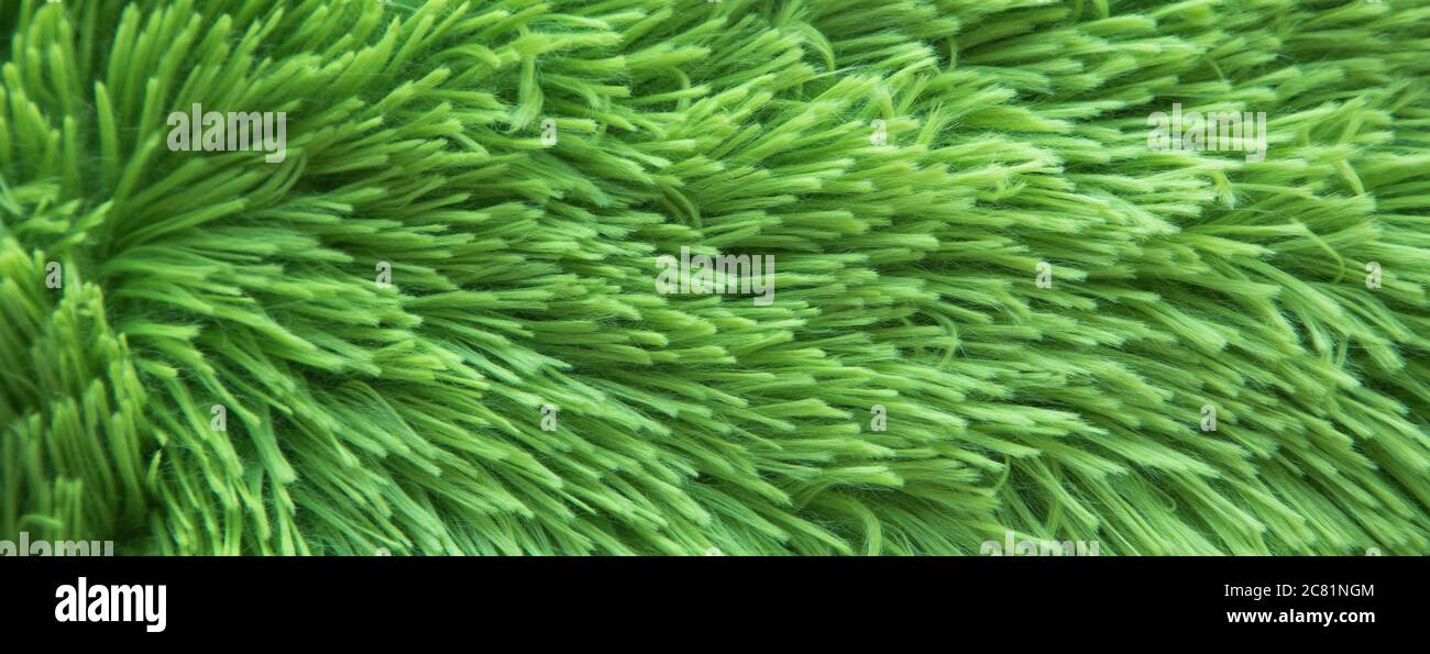 Abstract green fur background Stock Photo - Alamy