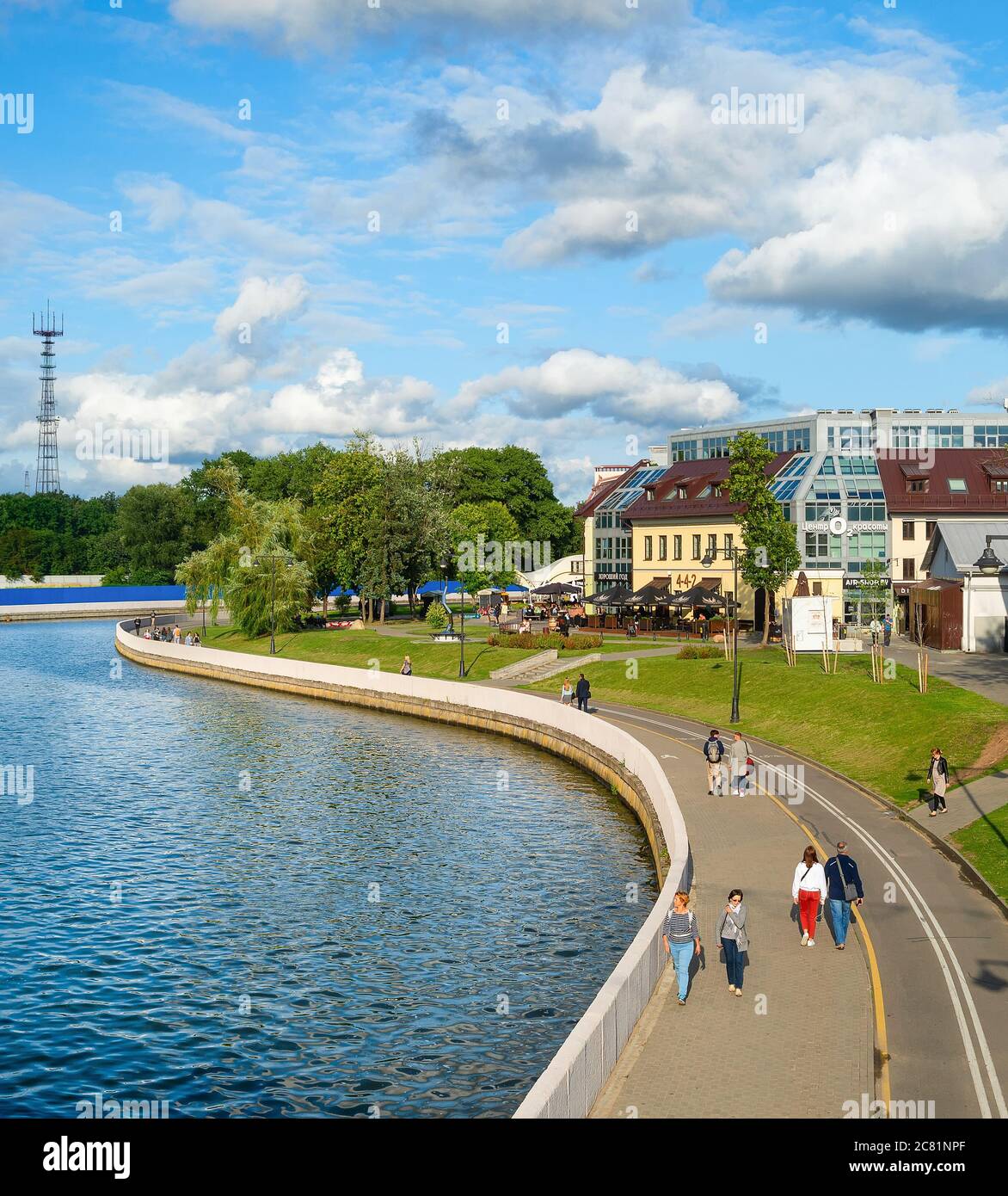MINSK, BELARUS - JULY 17, 2019: People walking by Svisloch river ...