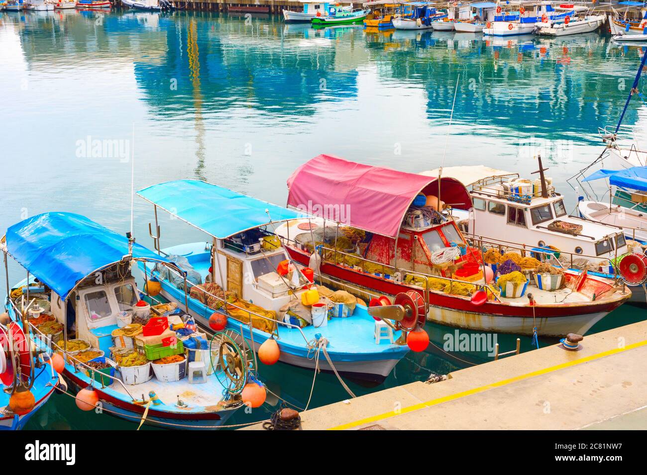 Typical Cyprus fishing boats in Limassol harbor Stock Photo - Alamy