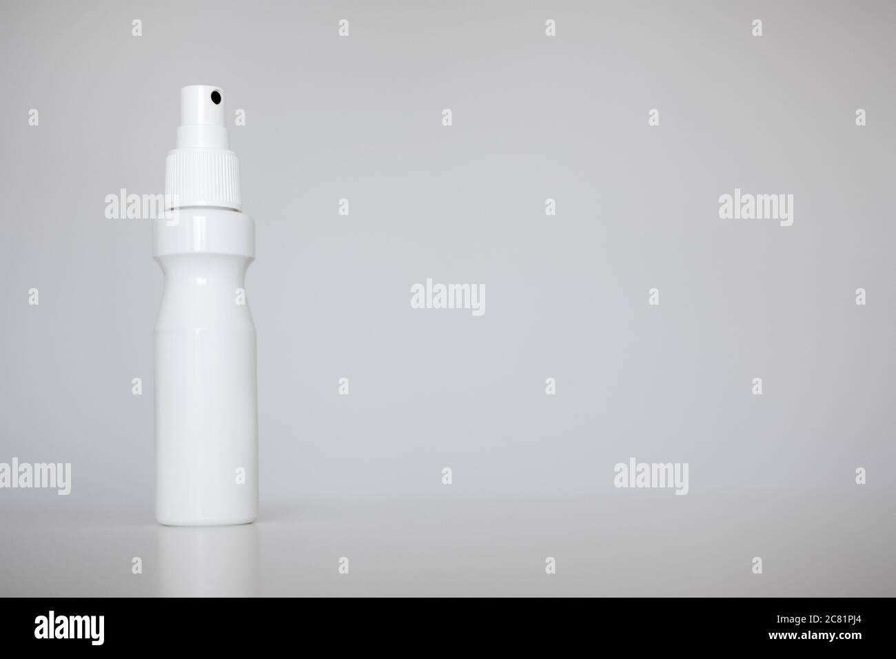 hand hygiene or disinfection concept - spray bottle of sanitizer or ...