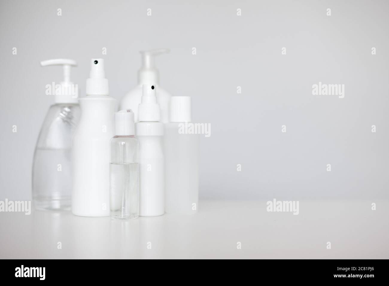 hand hygiene and disinfection concept - many different hand sanitizer ...