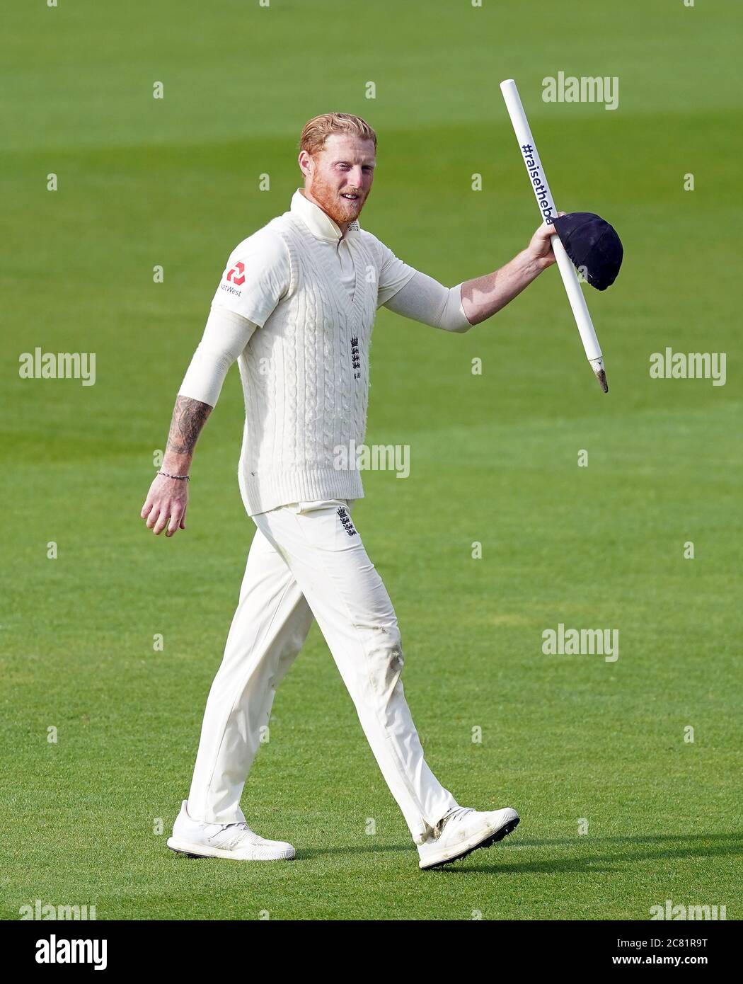 England's Ben Stokes walks off with a stump after their win on day five ...