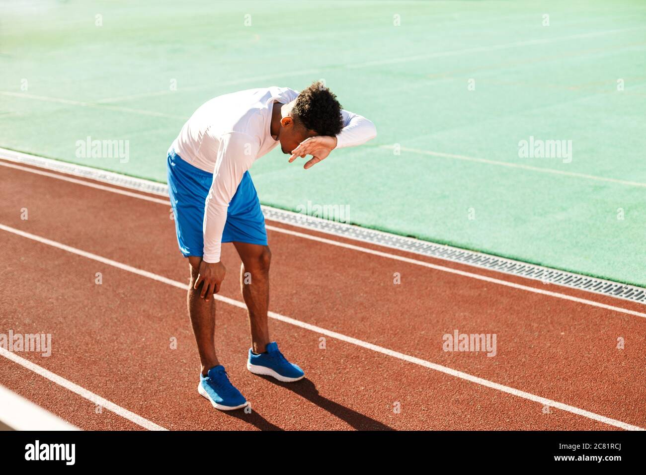 Exhausted runner ethnic hi-res stock photography and images - Alamy