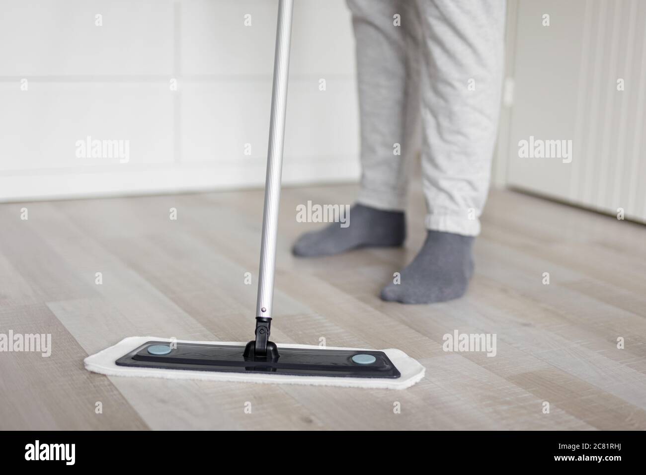 Housewife mopping floor in living hi-res stock photography and images ...