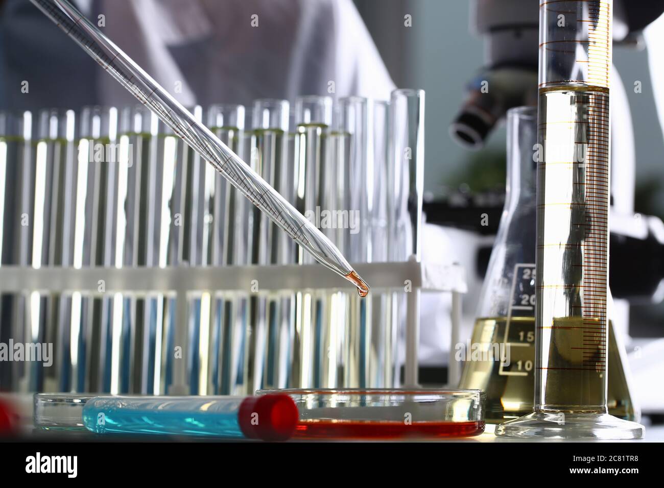 Professional doing chemical experiments with vials in laboratory Stock ...