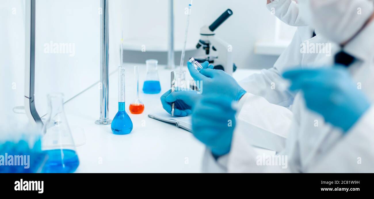 Group scientists analyzing results hi-res stock photography and images ...
