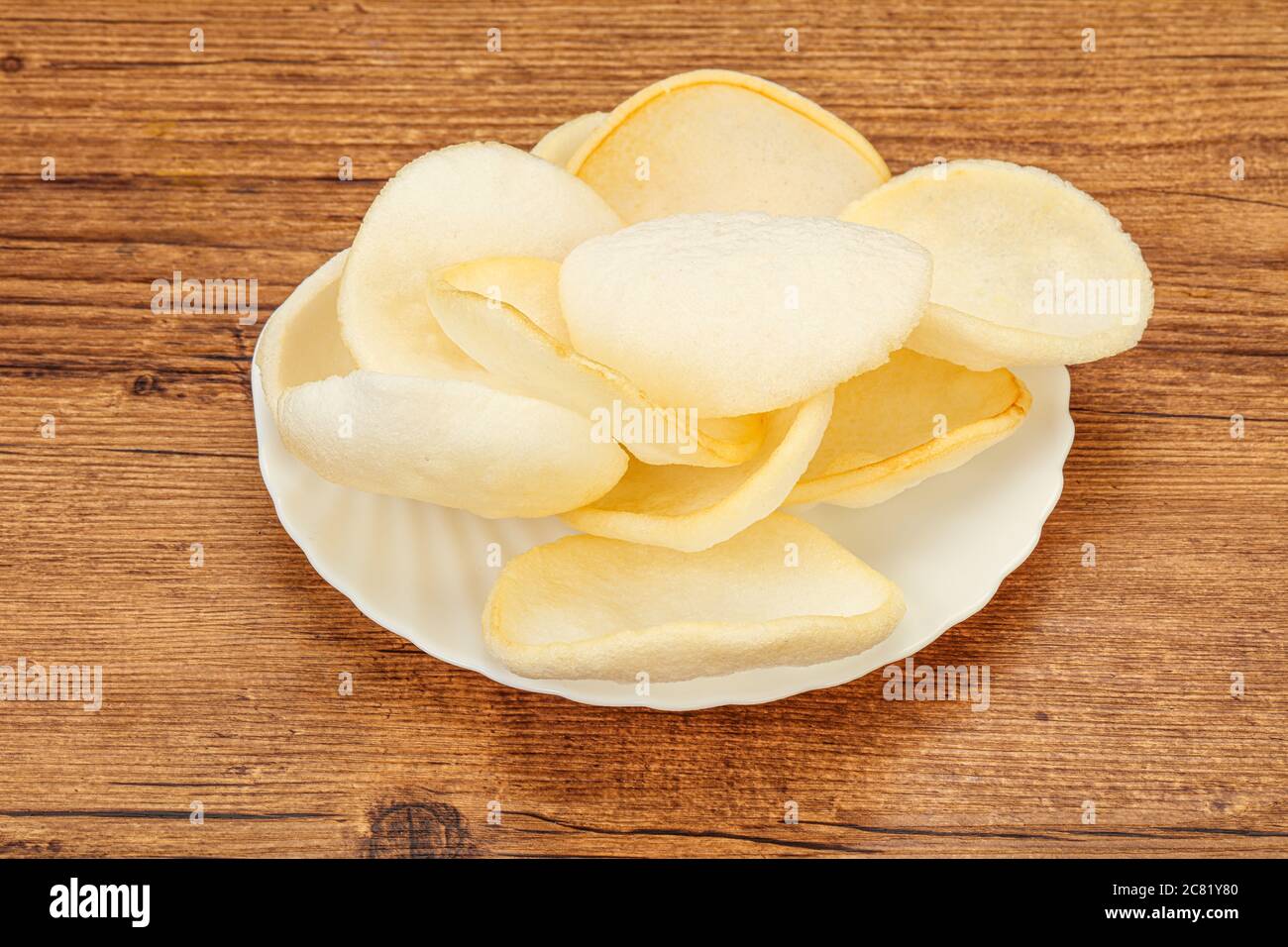 Asian cusine - homemade prawn chips in the bowl Stock Photo - Alamy
