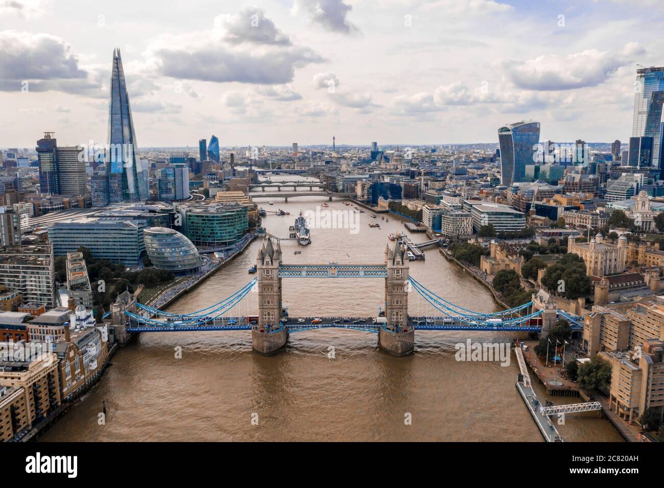 Aerial view of the Tower Bridge with a lot of high-rise buildings in ...