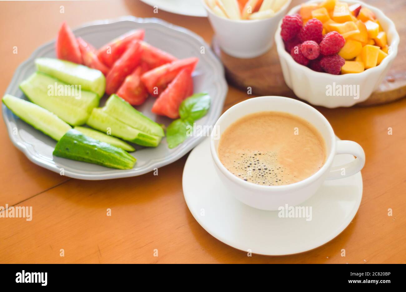 Breakfast with coffee, vegetables and fruits Stock Photo - Alamy