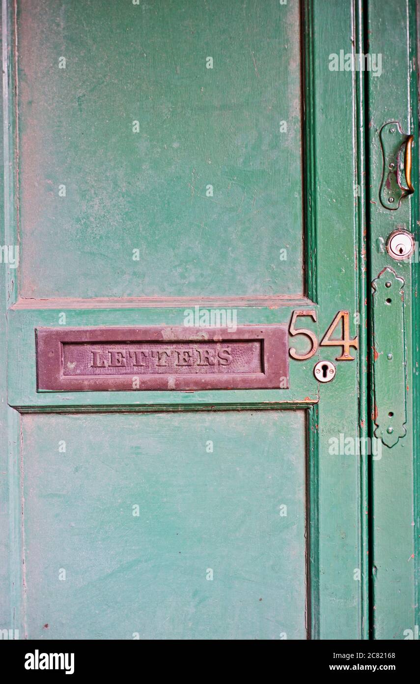 No 54 Green Wooden Door Stock Photo - Alamy
