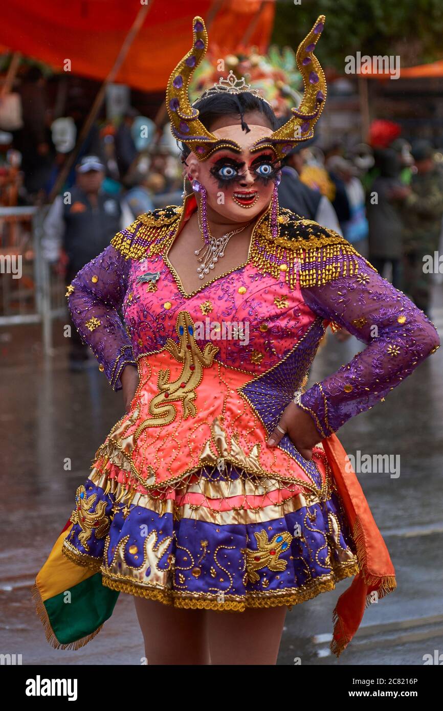 Diablada dancers in ornate costumes parade through the mining city of ...