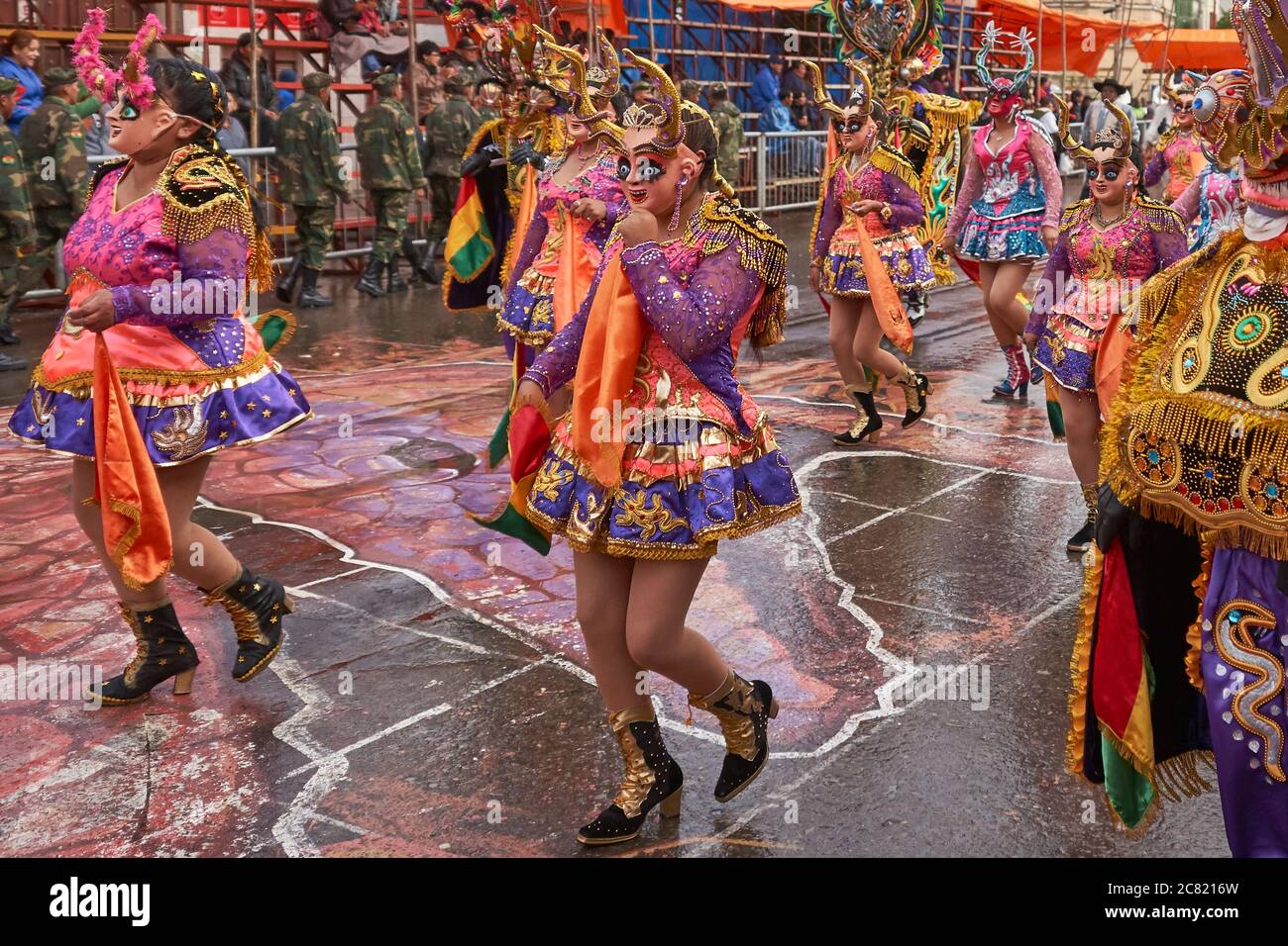 Diablada dancers in ornate costumes parade through the mining city of ...