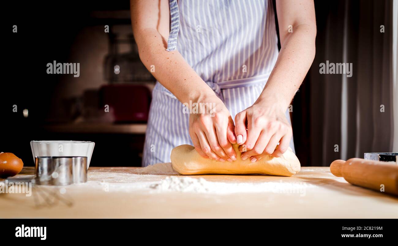 Hands on view mixing dough hi-res stock photography and images - Alamy