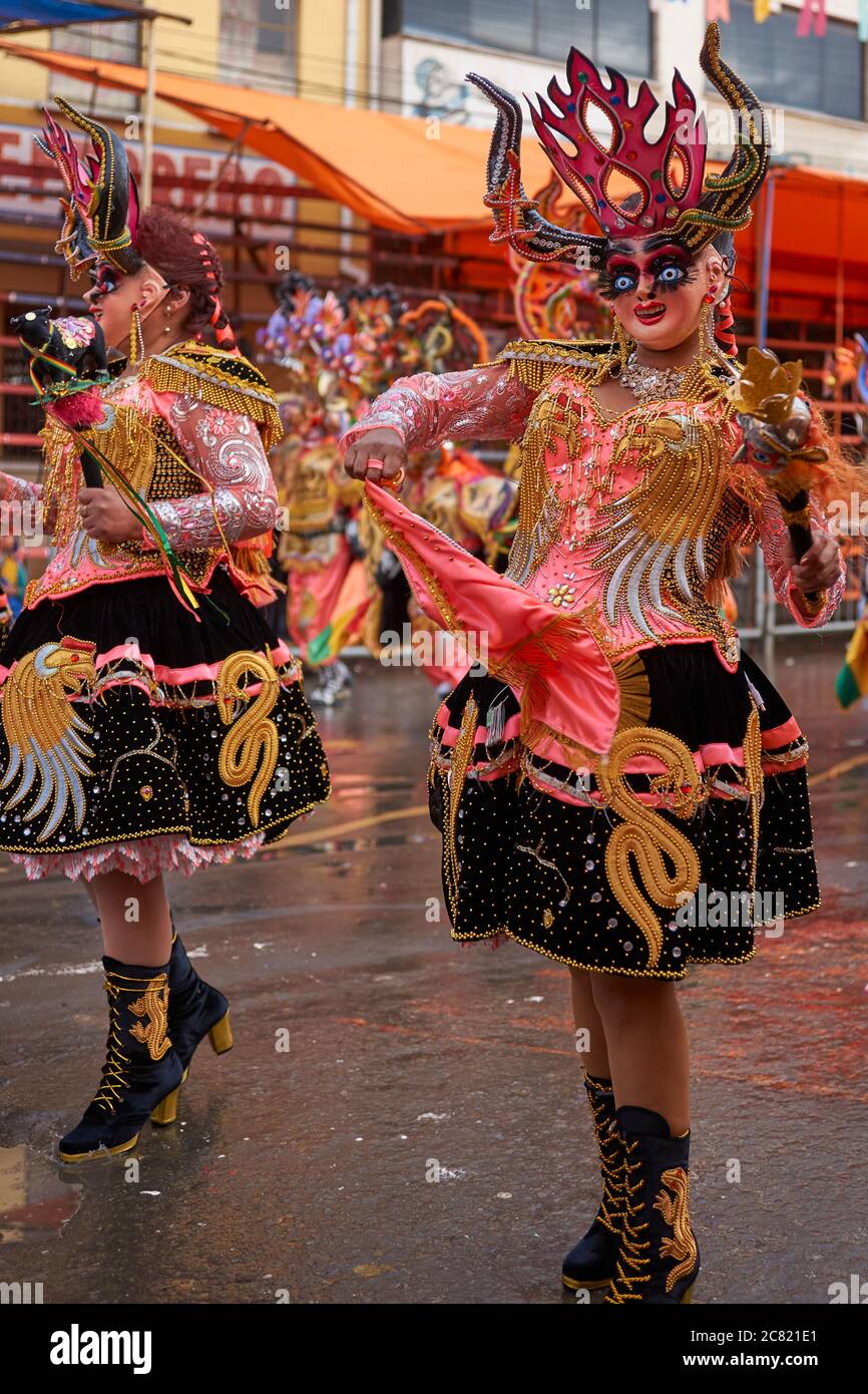 Diablada dancers in ornate costumes parade through the mining city of ...