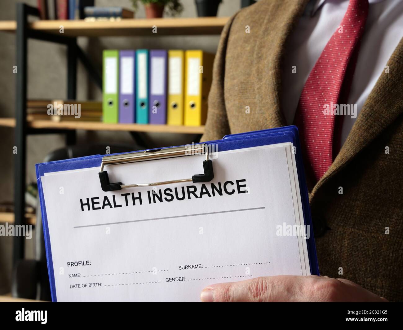 Health insurance agreement empty form for signing Stock Photo - Alamy