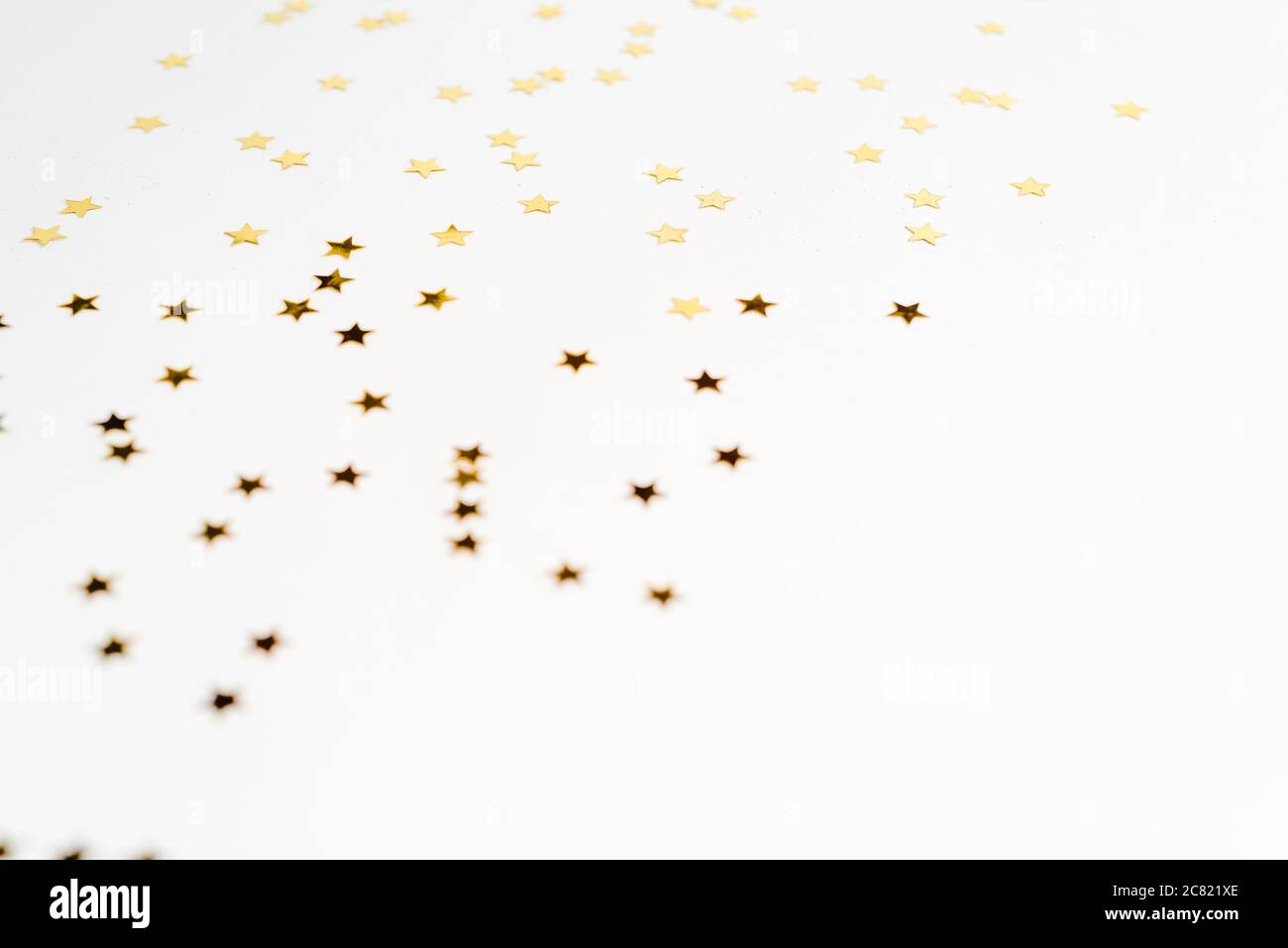 Group of gold star decoration isolated on white background top view ...
