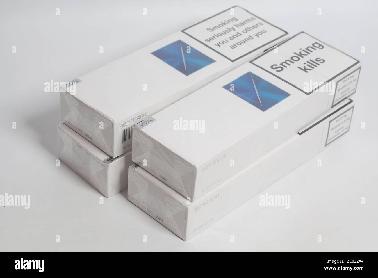 Carton of cigarettes, on white background Stock Photo - Alamy