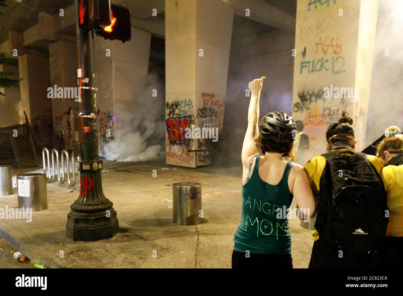 Portland, USA. 19th July, 2020. Protesters dismantle a fence at ...