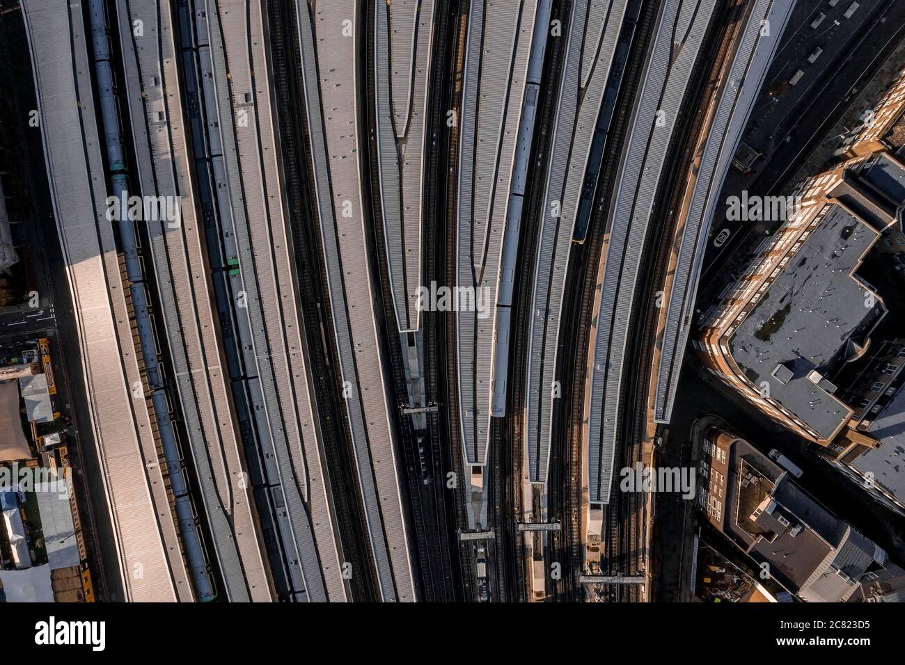 Aerial overhead shot of a a cityscape with flat roofs of buildings ...