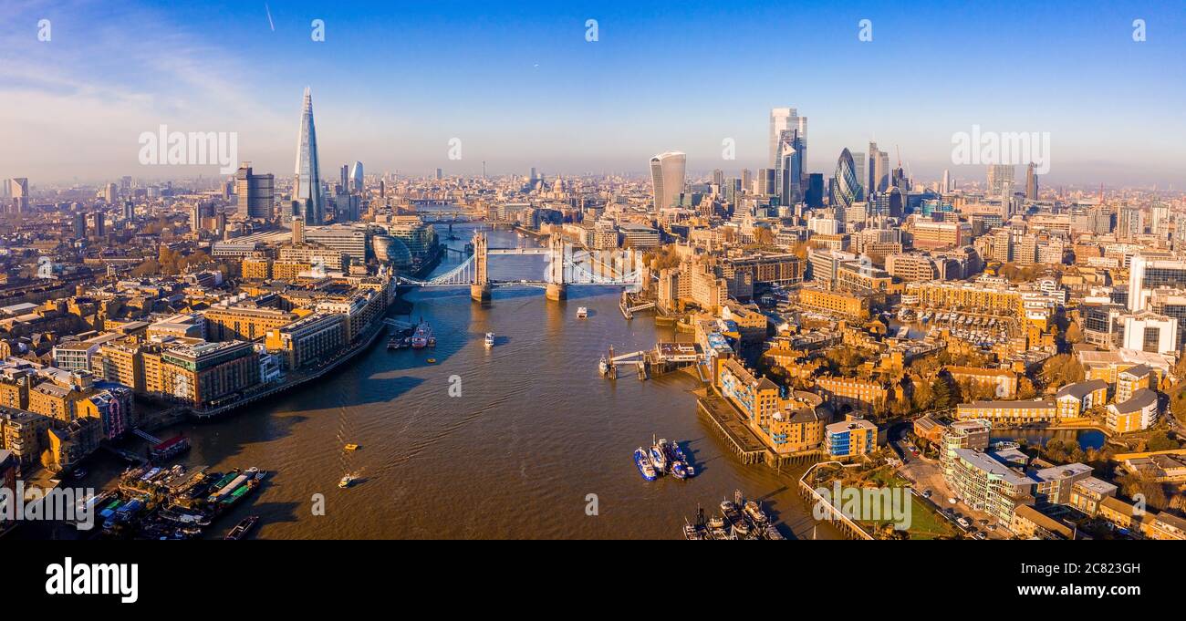 Aerial photo of an urban city with a river crossing, skyscrapers and ...
