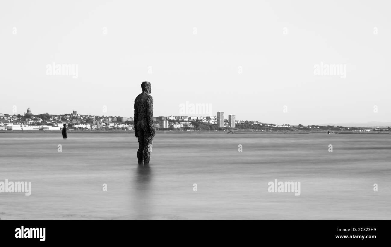 Man or the iron man statue by antony gormley Black and White Stock ...