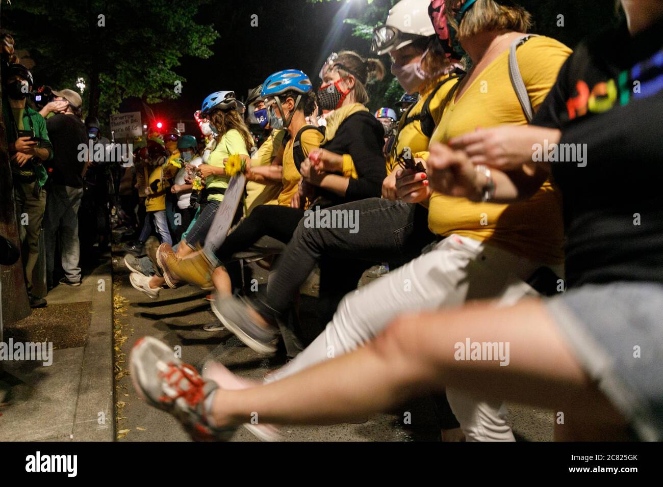 Portland, USA. 19th July, 2020. Hundreds of protesters, including a ...