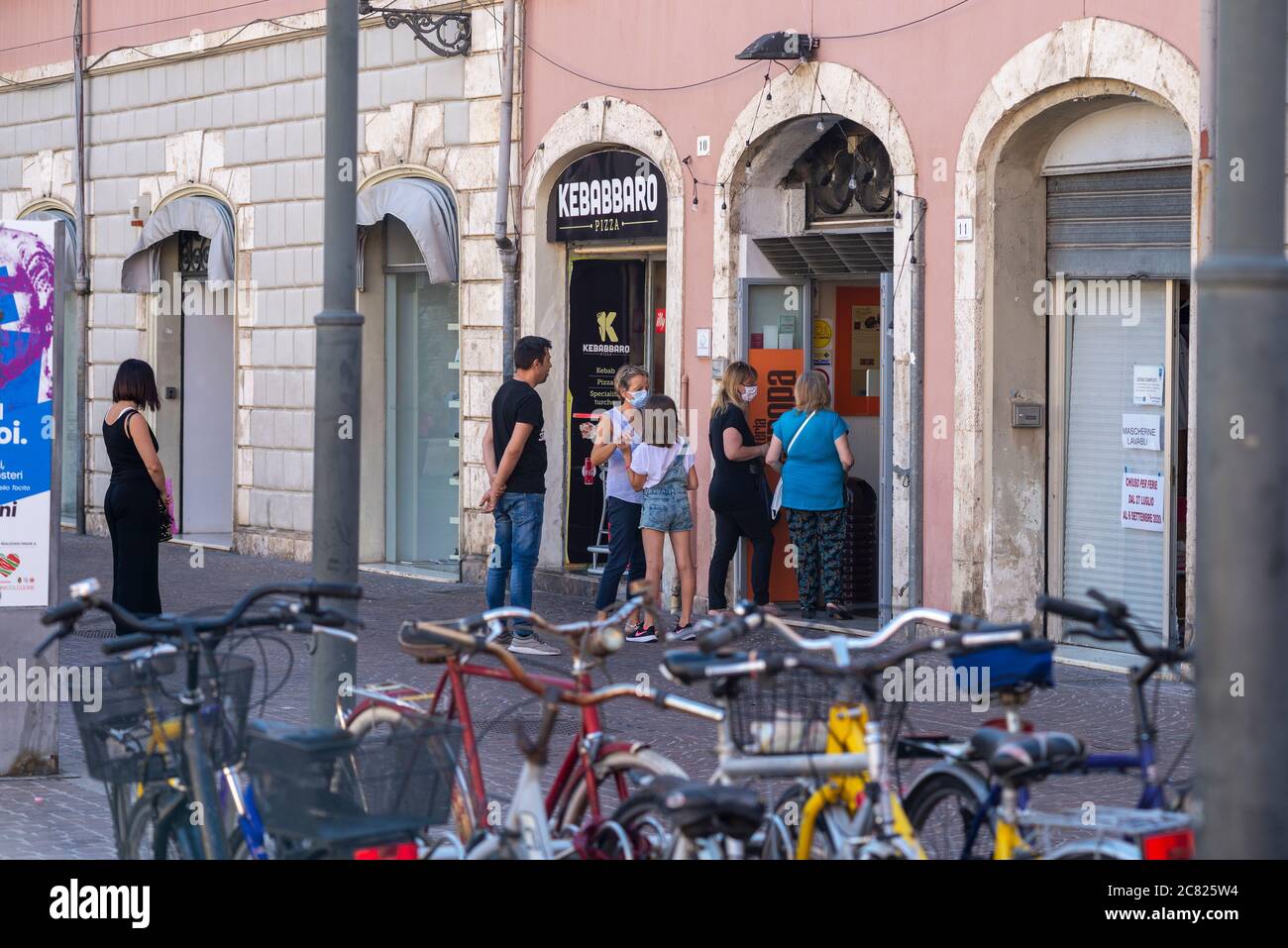terni, italy july 20 2020:queue in the ice cream shop and distancing ...
