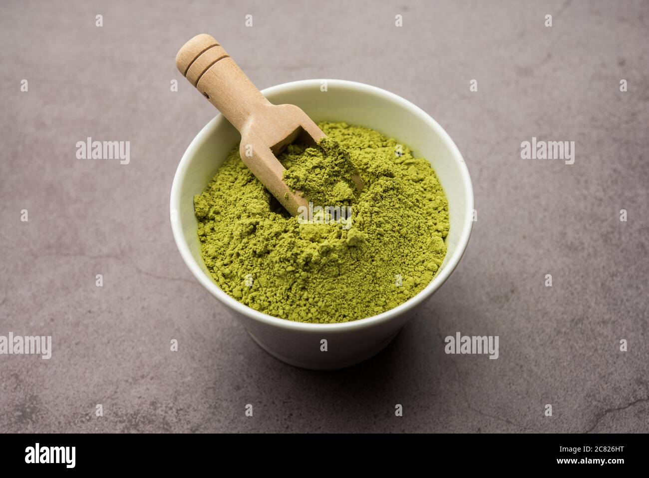 Herbal henna or Mehandi powder in a bowl forming heap, Used for Tattoo ...