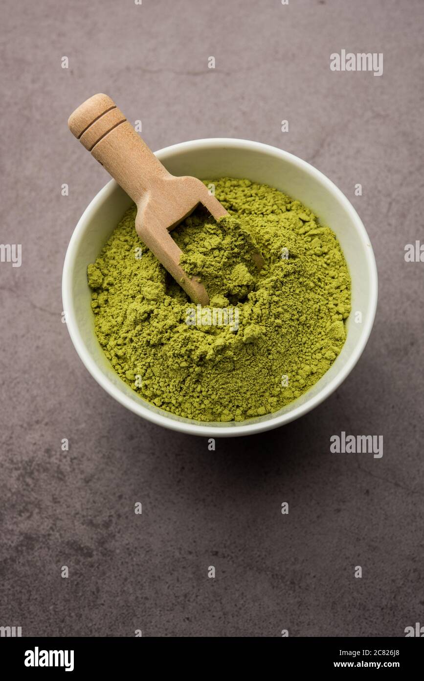 Herbal henna or Mehandi powder in a bowl forming heap, Used for Tattoo ...