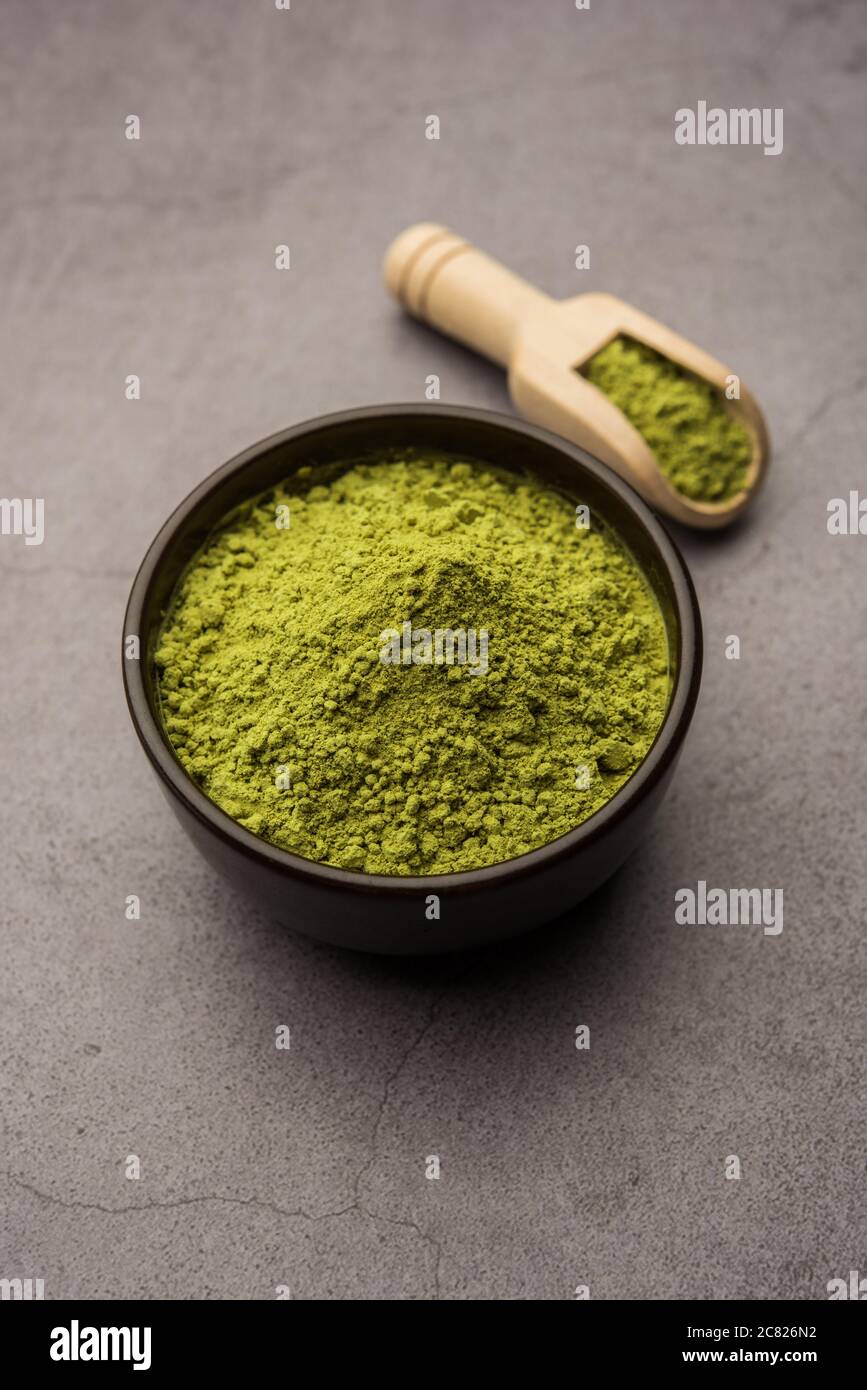 Herbal henna or Mehandi powder in a bowl forming heap, Used for Tattoo ...
