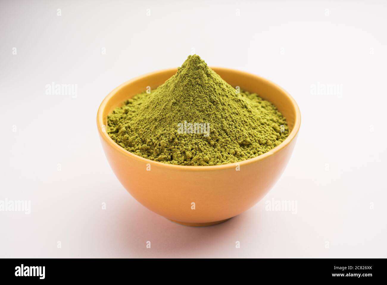 Herbal henna or Mehandi powder in a bowl forming heap, Used for Tattoo ...