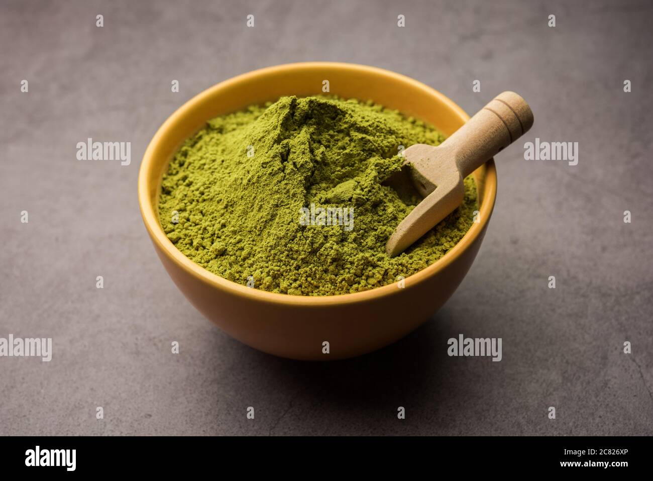 Herbal henna or Mehandi powder in a bowl forming heap, Used for Tattoo ...