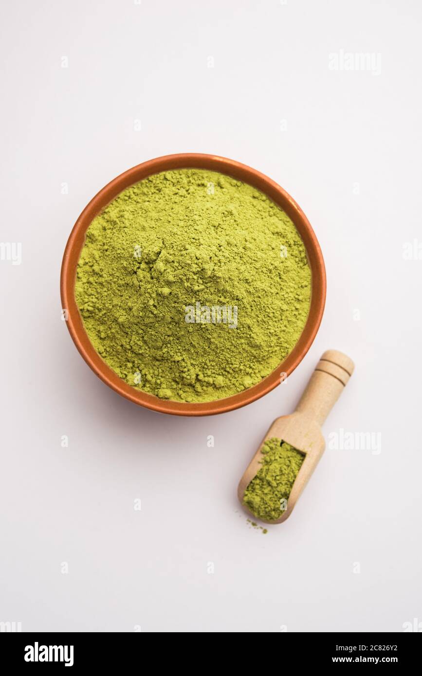 Herbal henna or Mehandi powder in a bowl forming heap, Used for Tattoo ...