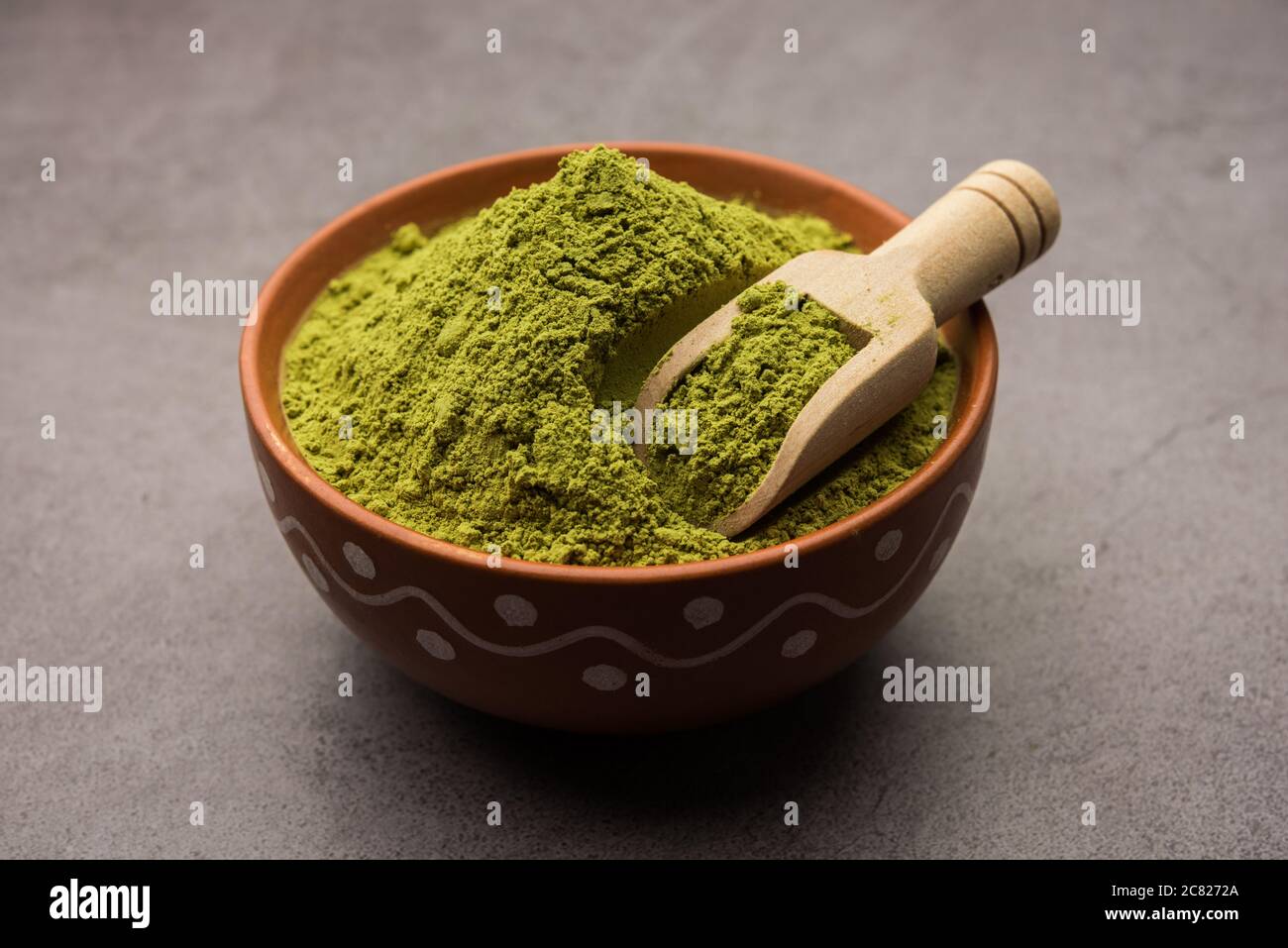Herbal henna or Mehandi powder in a bowl forming heap, Used for Tattoo ...